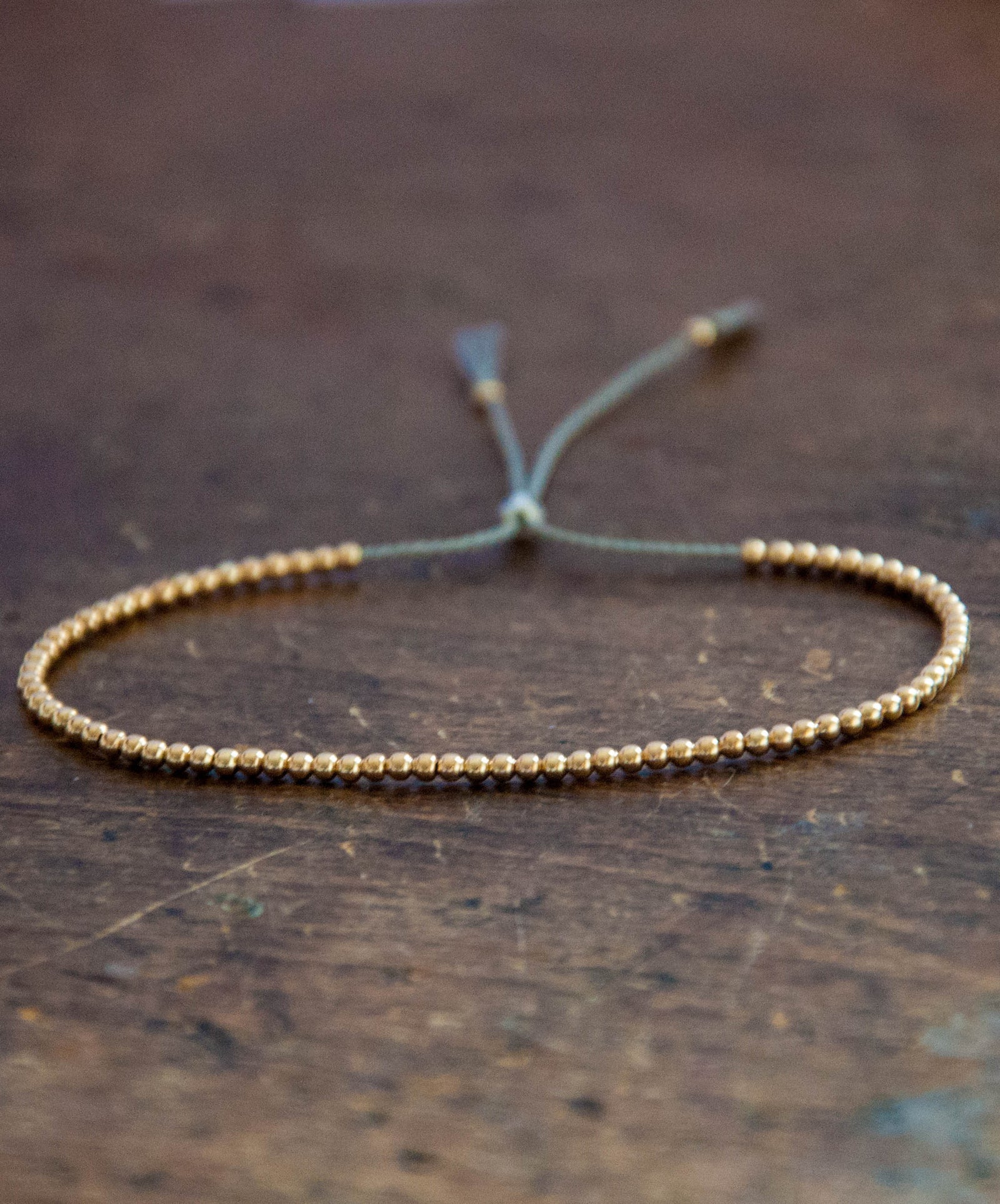 thin gold beaded bracelets